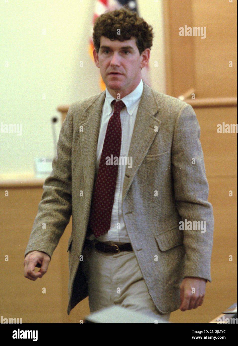 Former assistant Attorney General William McCallum walks out of a ...