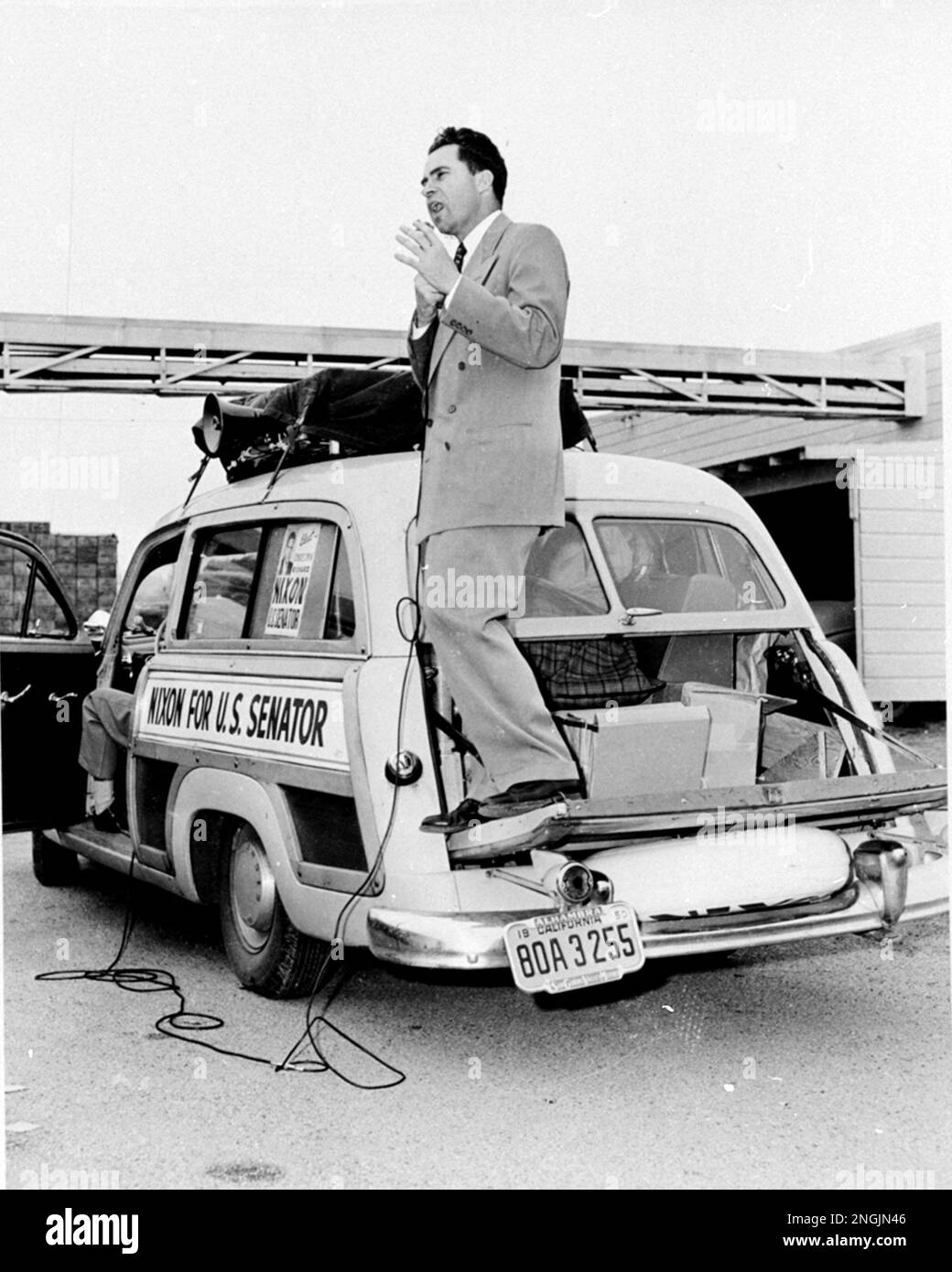 Using the bumper of his car as his podium, Rep. Richard Nixon, R-Ill ...