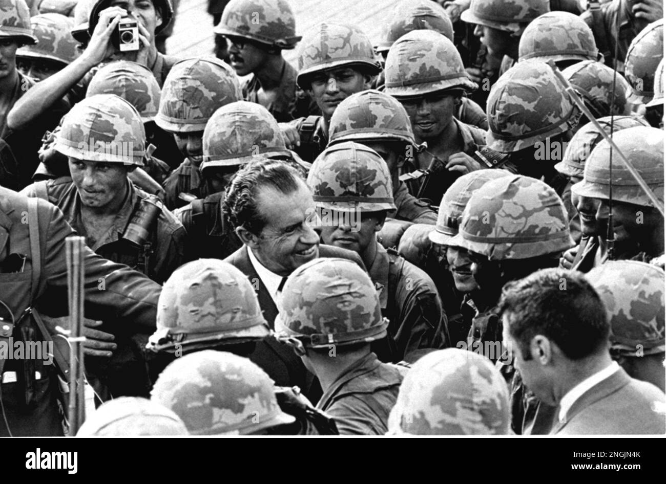 President Nixon is surrounded by combat infantrymen of the U.S. First ...