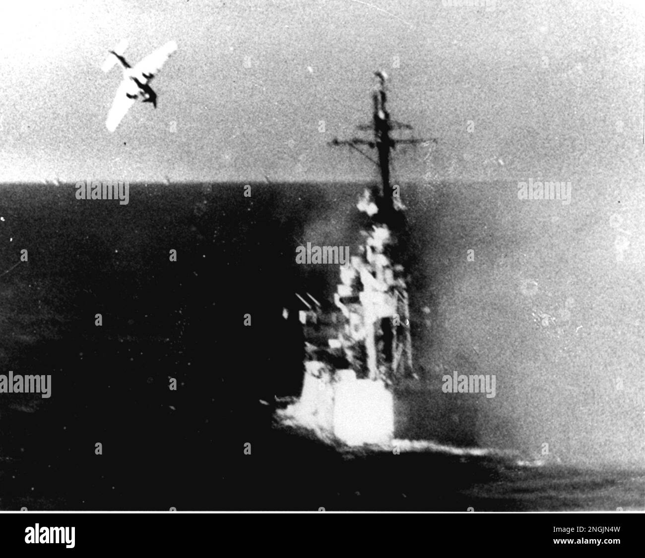 A Japanese Kamikaze suicide plane is shown swooping down on a U.S ...