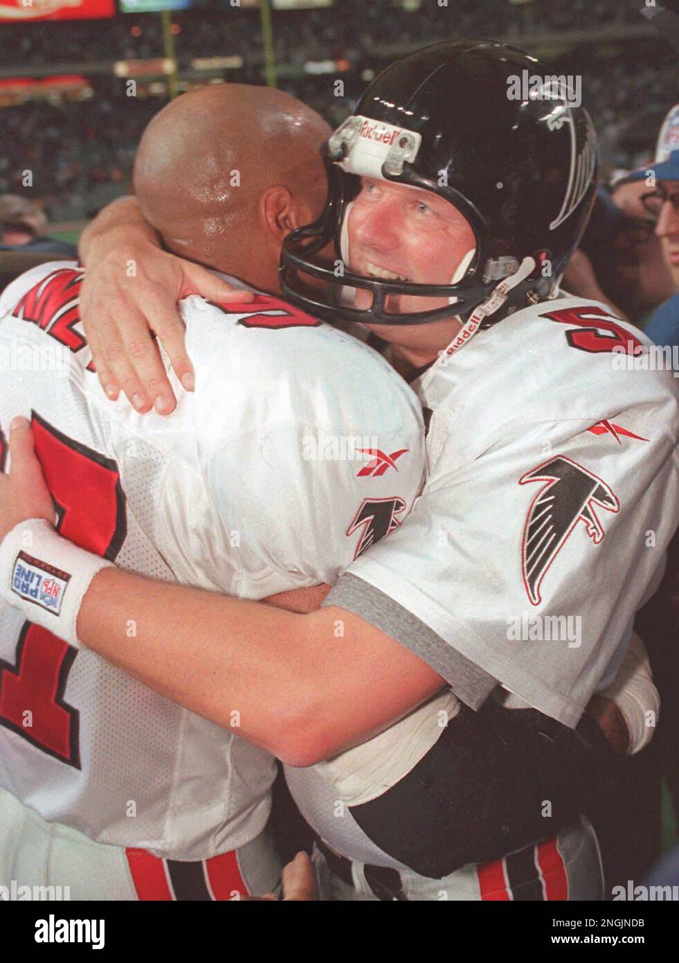 Atlanta Falcons kicker Morten Andersen, right, hugs teammate Cornelius ...