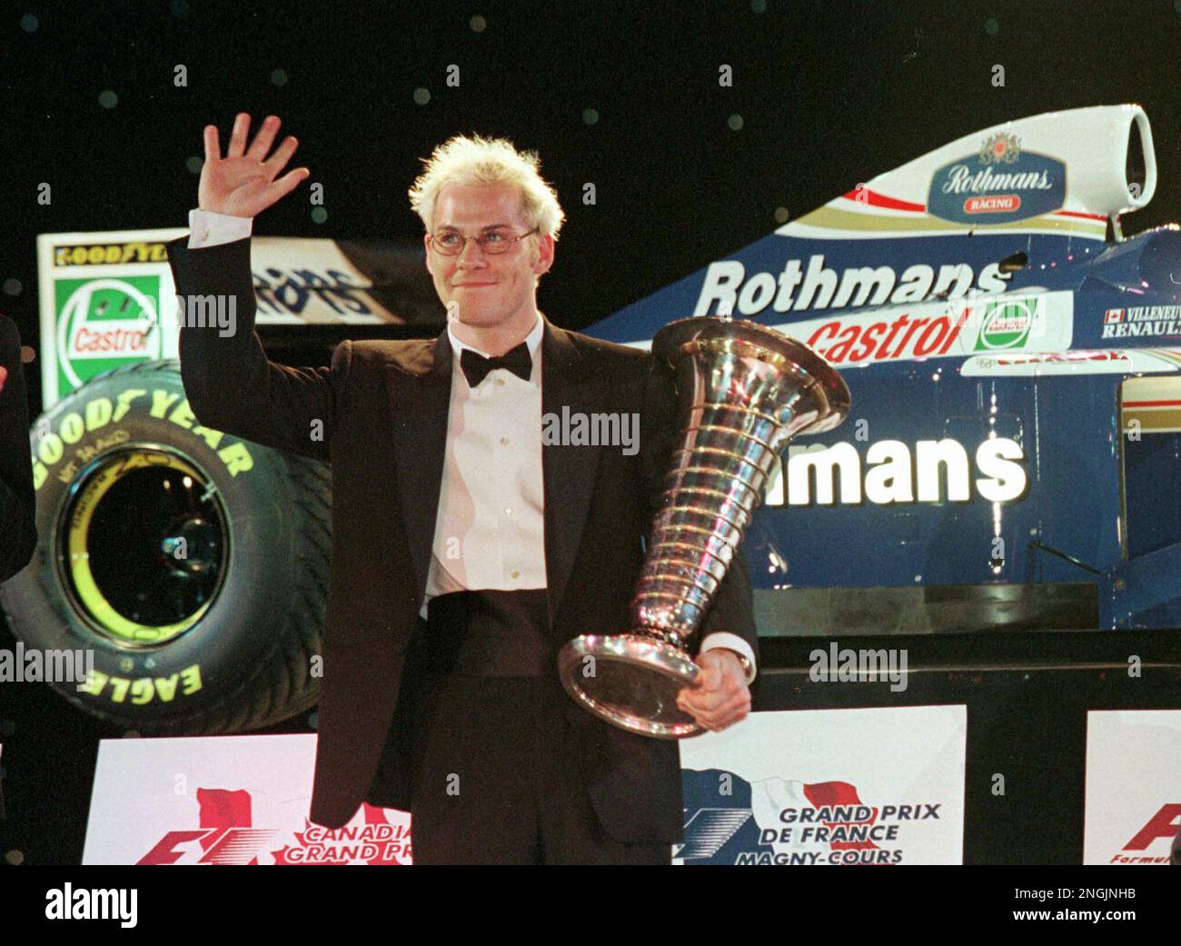 Canadian champion Jacques Villeneuve holds his FIA Formula One World ...
