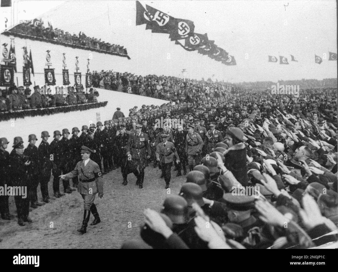 Crowds cheer the arrival of German Chancellor Adolf Hitler at ...