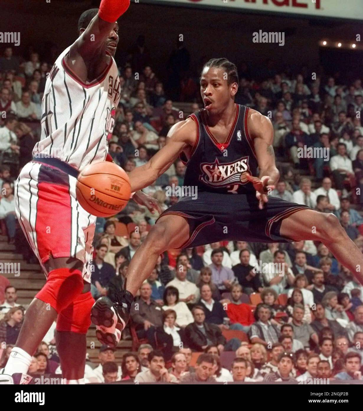Philadelphia 76ers Allen Iverson (3) goes into the air against Houston ...