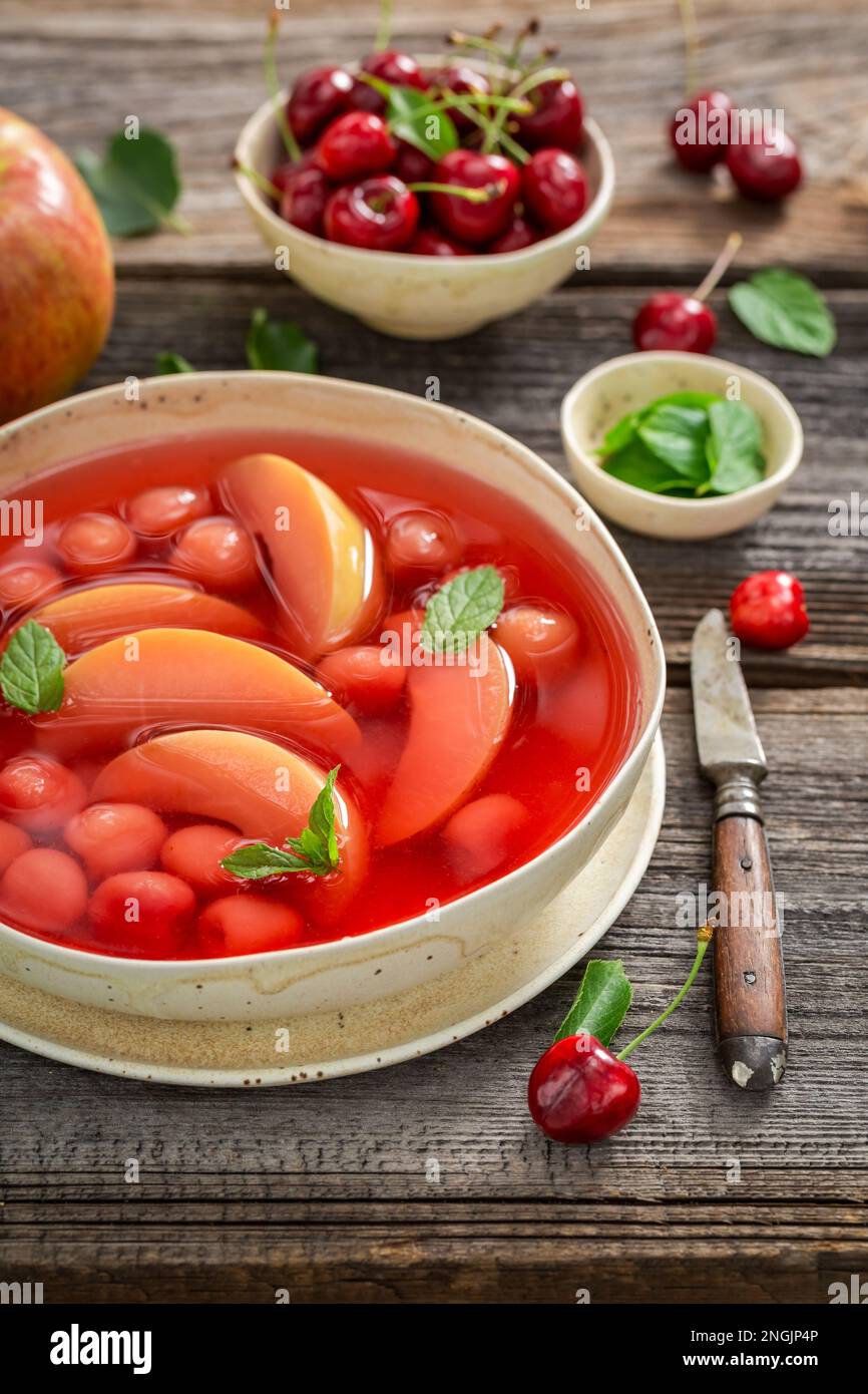 Sweet and healthy fruit soup made of summer fruits. Freshly picked ...