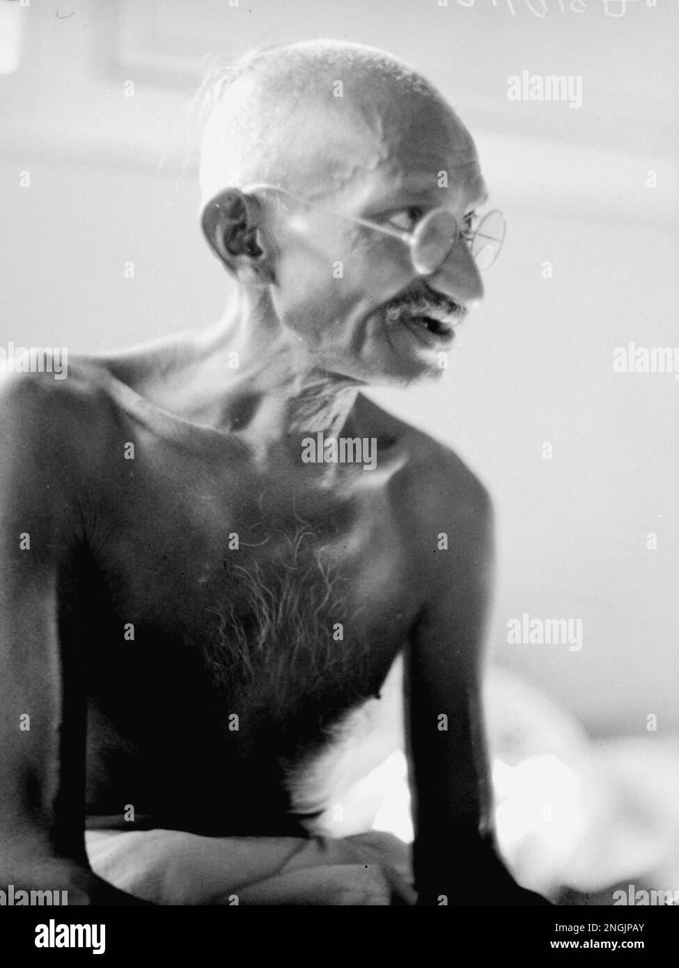 Mohandas Gandhi, leader of India's great movement for liberty, is shown ...