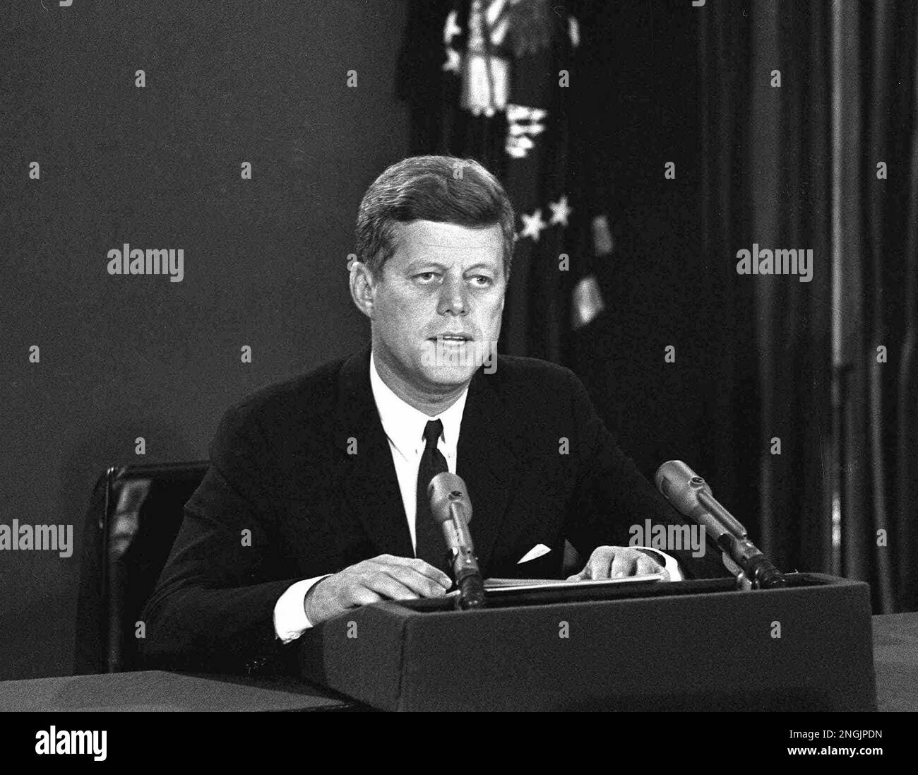 President John F. Kennedy makes a national television speech October 22 ...