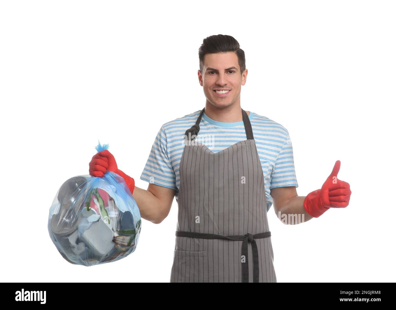 Man holding full garbage bag on white background Stock Photo - Alamy