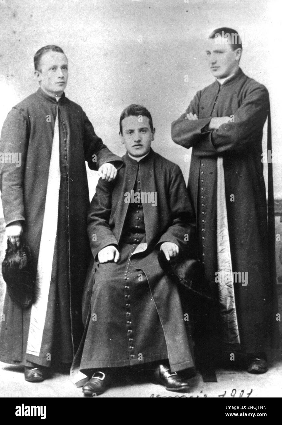 Angelo Giuseppe Roncalli (center) photographed with two unidentified ...