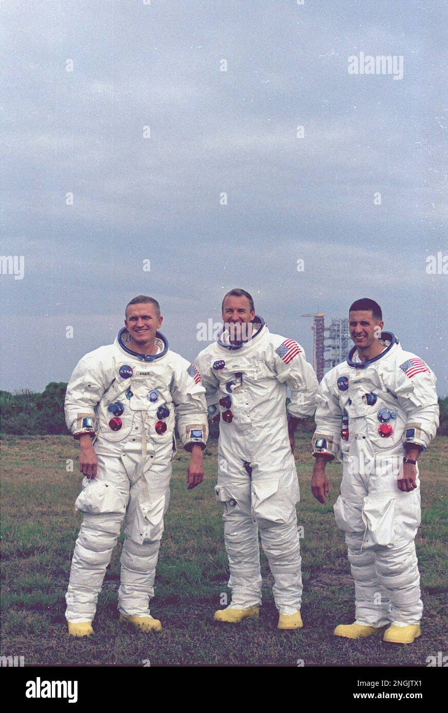 The Apollo 8 astronauts pose in front of the Saturn 5 Gantry, Cape ...