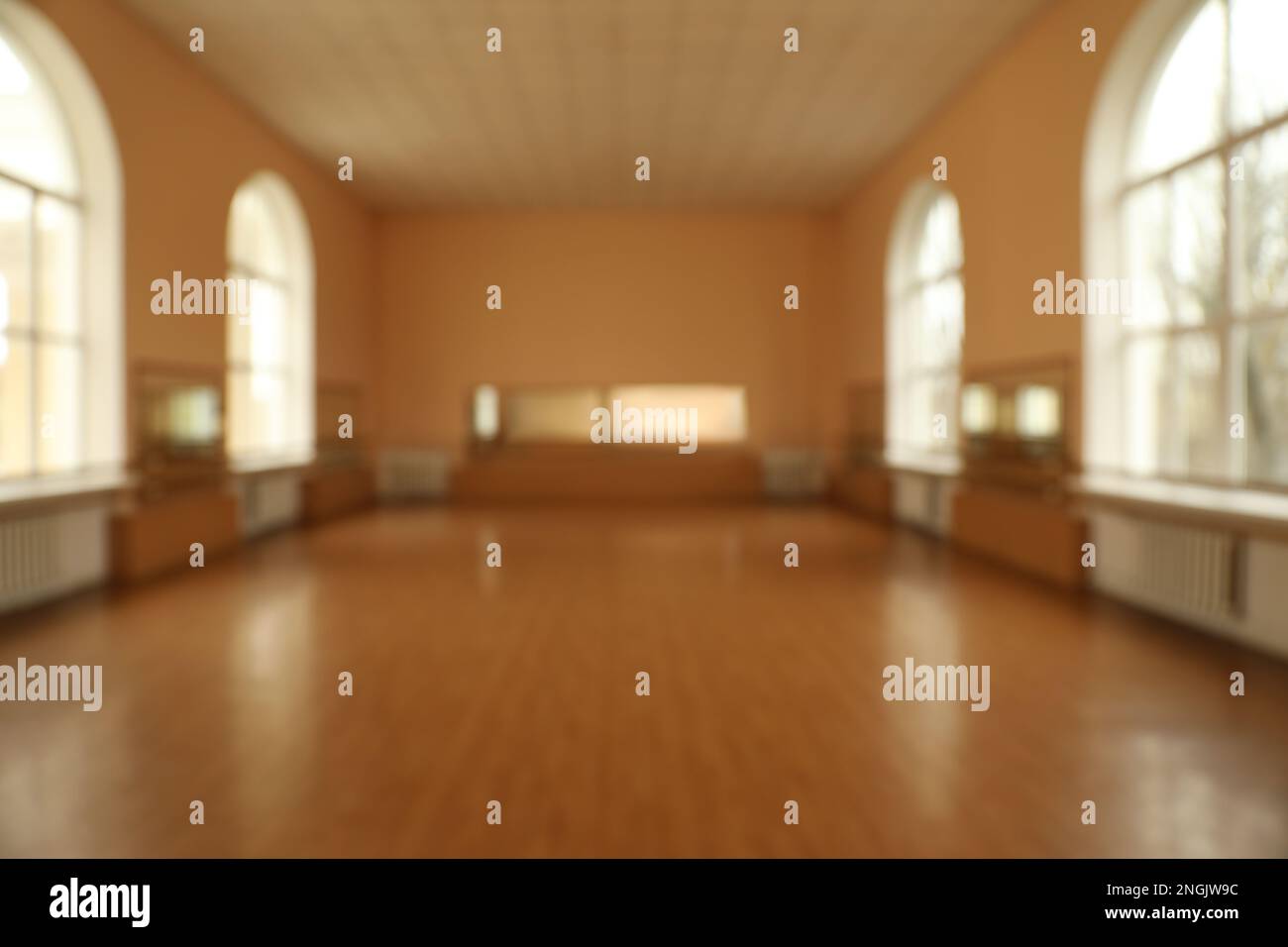 Blurred view of empty modern ballet studio Stock Photo - Alamy