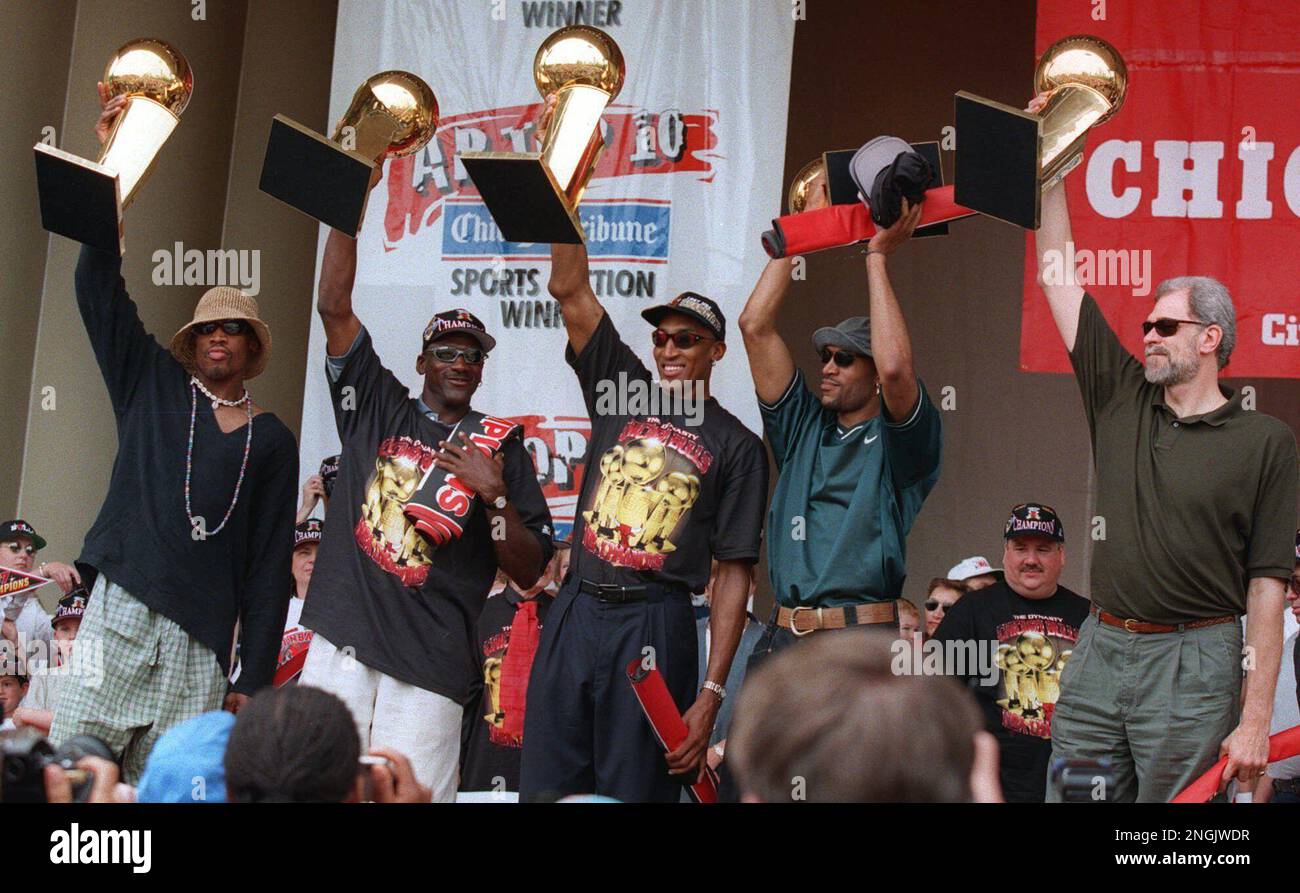 The Chicago Bulls' Dennis Rodman, left, Michael Jordan, Scottie Pippen ...