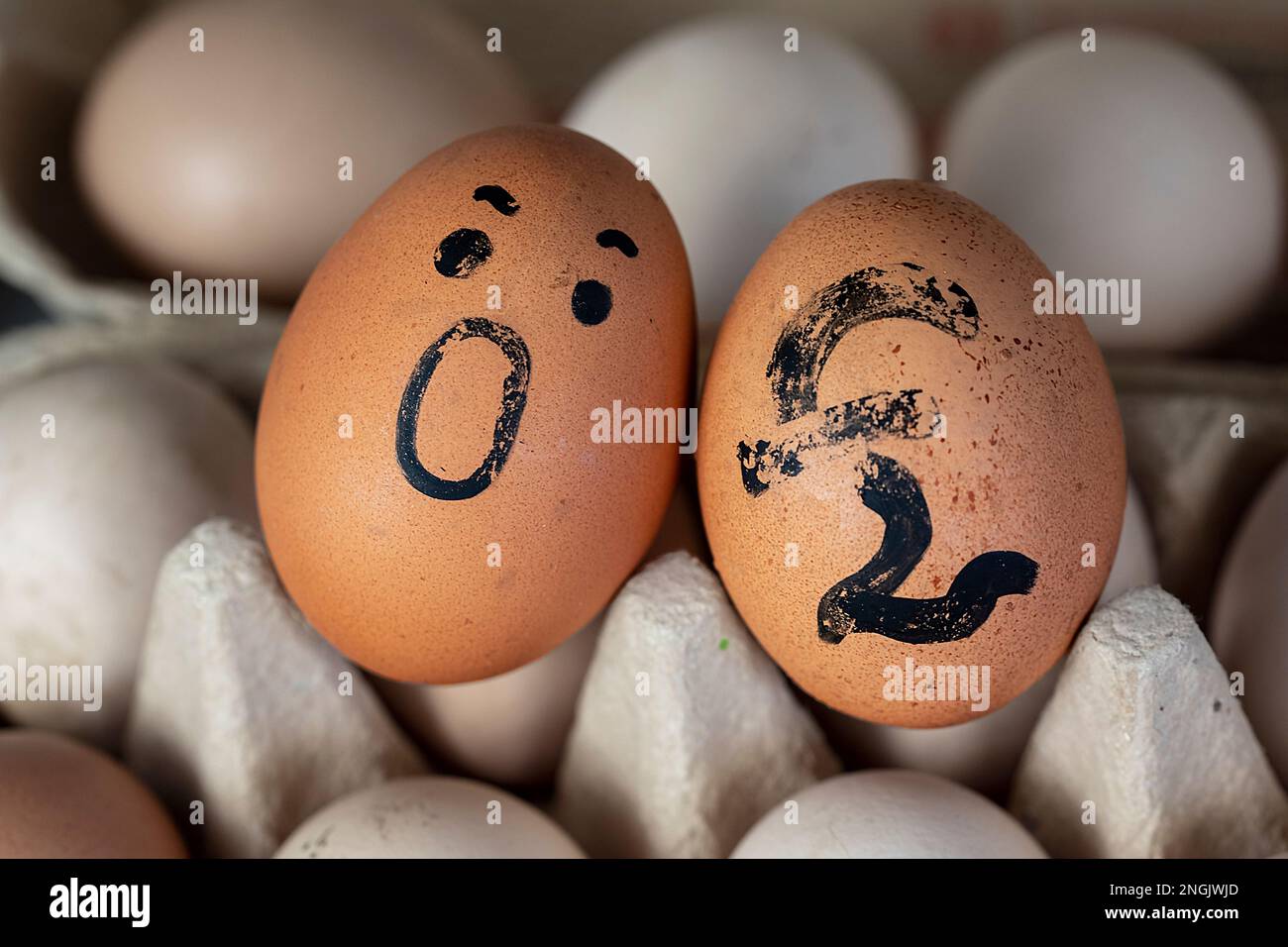 container with eggs and with a pound currency drawn by a marker. Rise ...