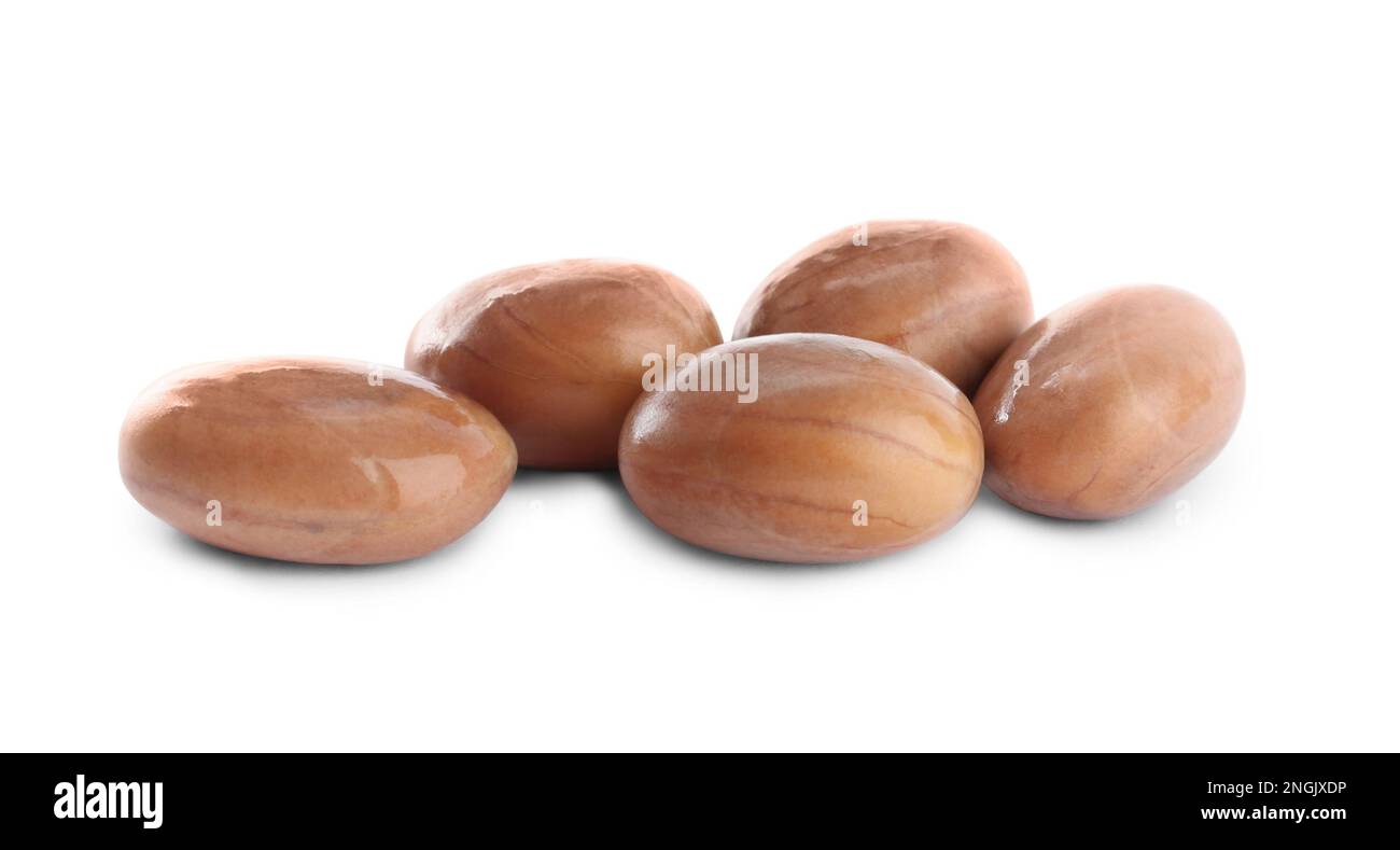 Many raw jackfruit seeds on white background Stock Photo - Alamy