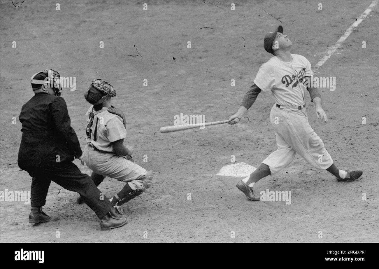 Brooklyn Dodgers slugger Duke Snider hits a pop foul in a game with ...