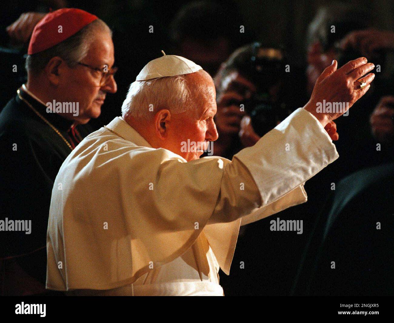 Pope John Paul II blesses the crowd in St. Vitus Cathedral after an ...