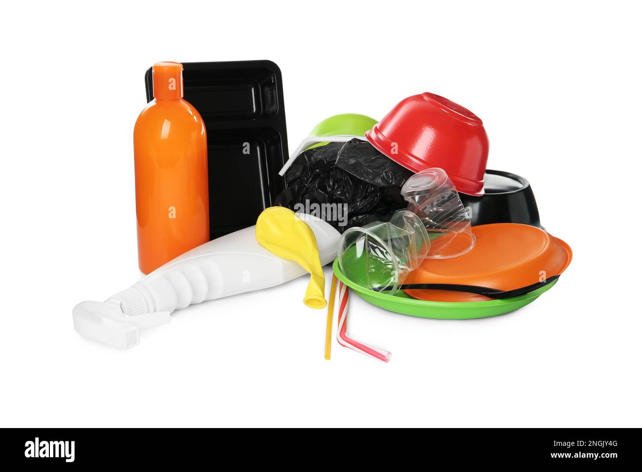 Pile of different plastic items on white background Stock Photo - Alamy