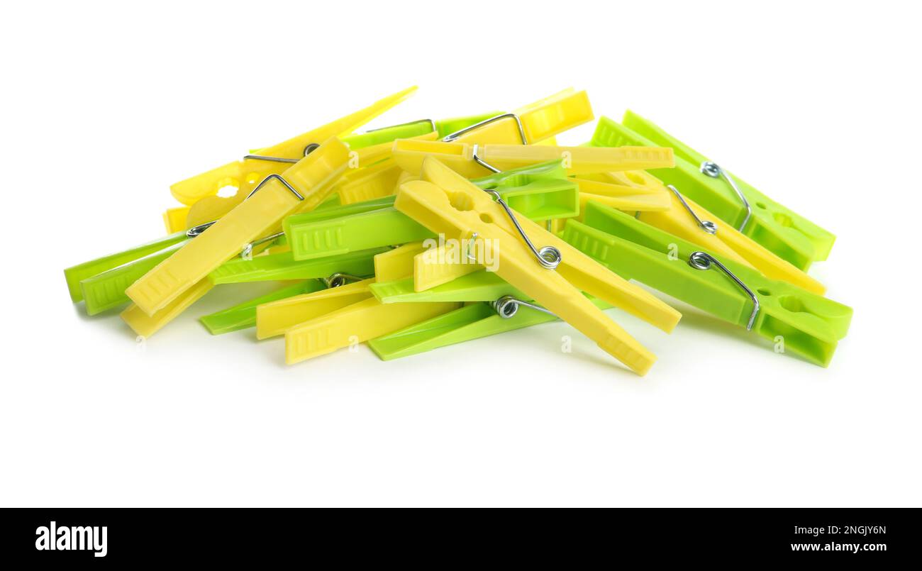 Many colorful plastic clothespins on white background Stock Photo - Alamy