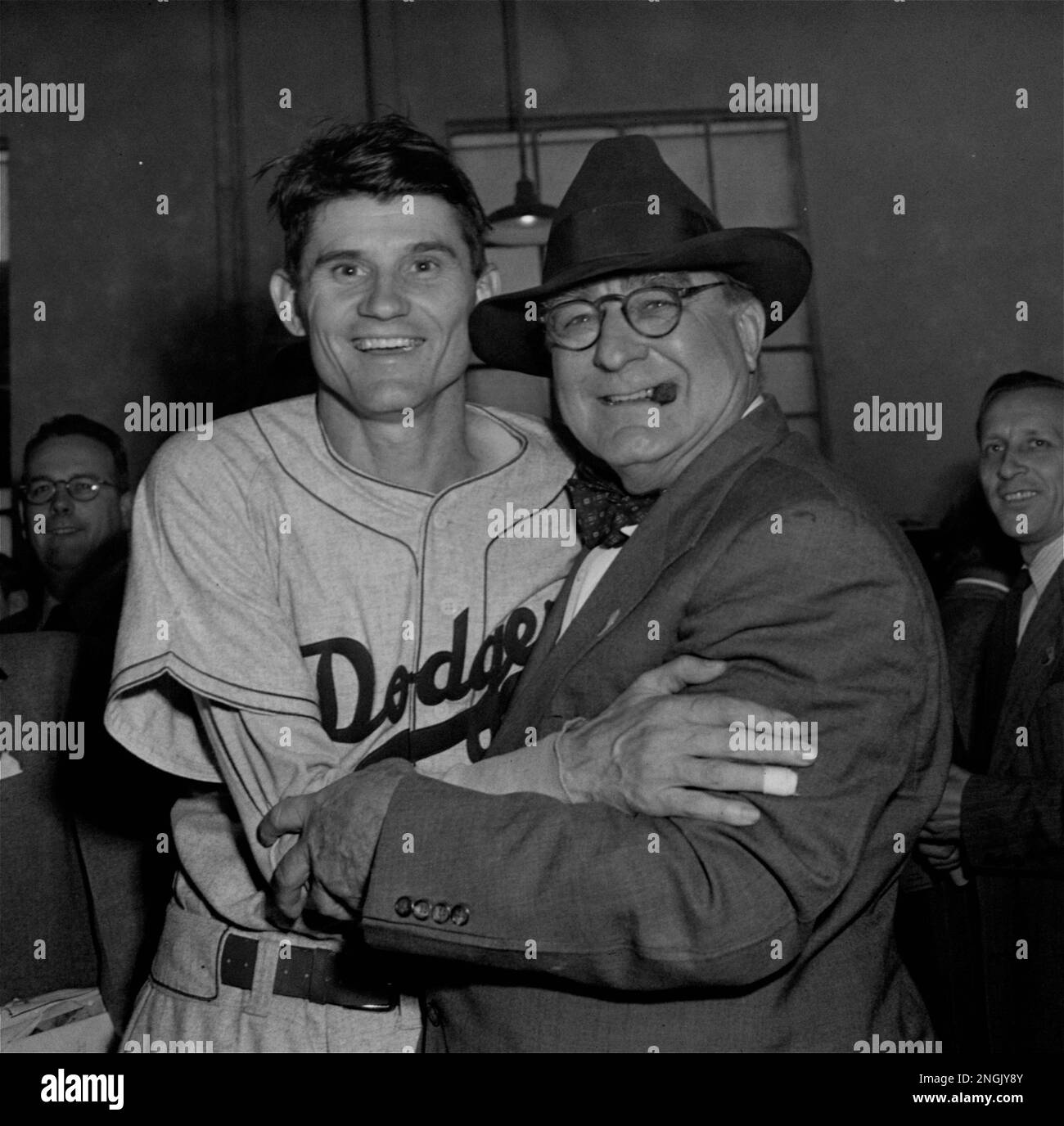 Branch Rickey, right, president of the Brooklyn Dodgers, embraces ...
