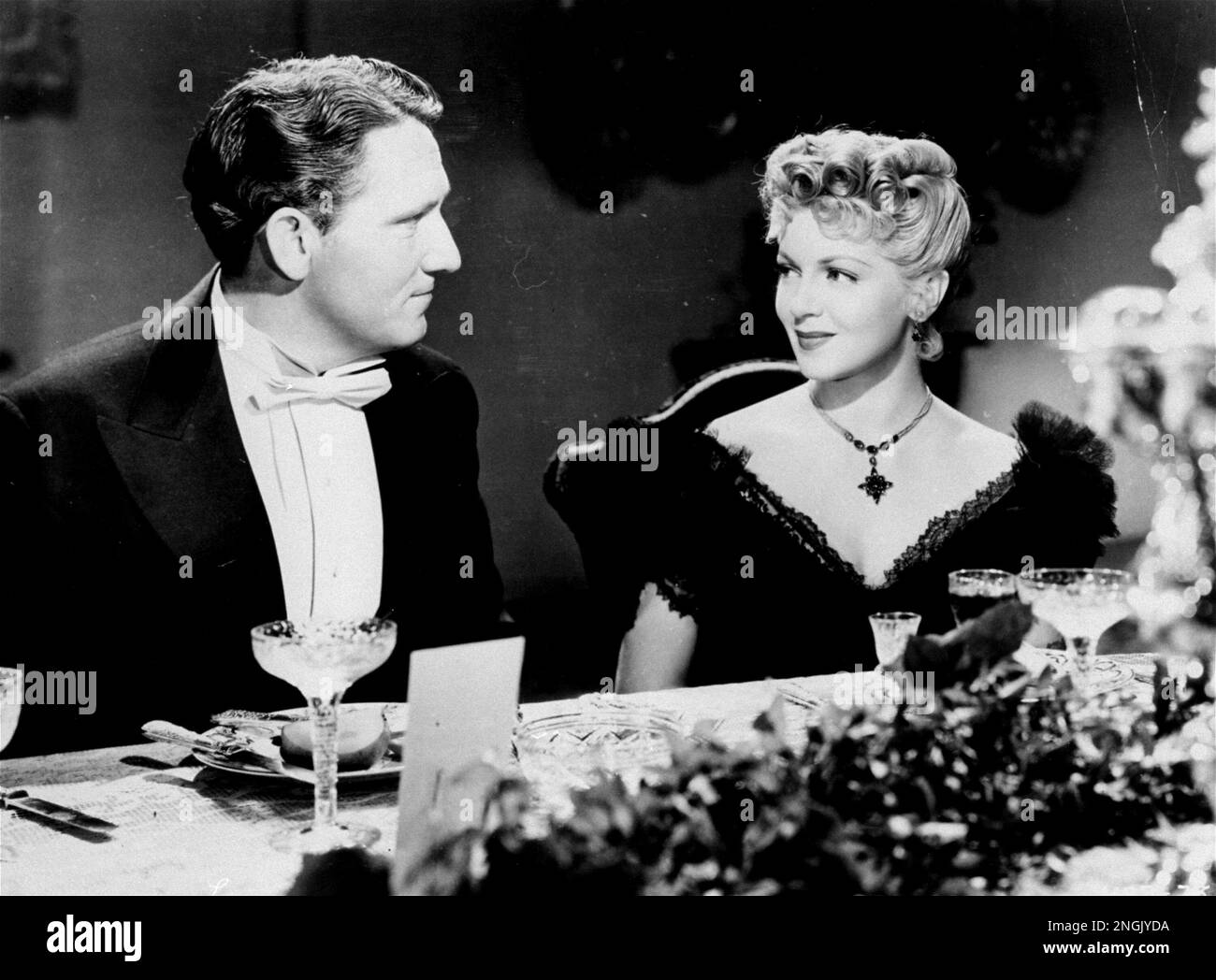 Spencer Tracy and Lana Turner are shown in a scene from "Dr. Jekyll and ...