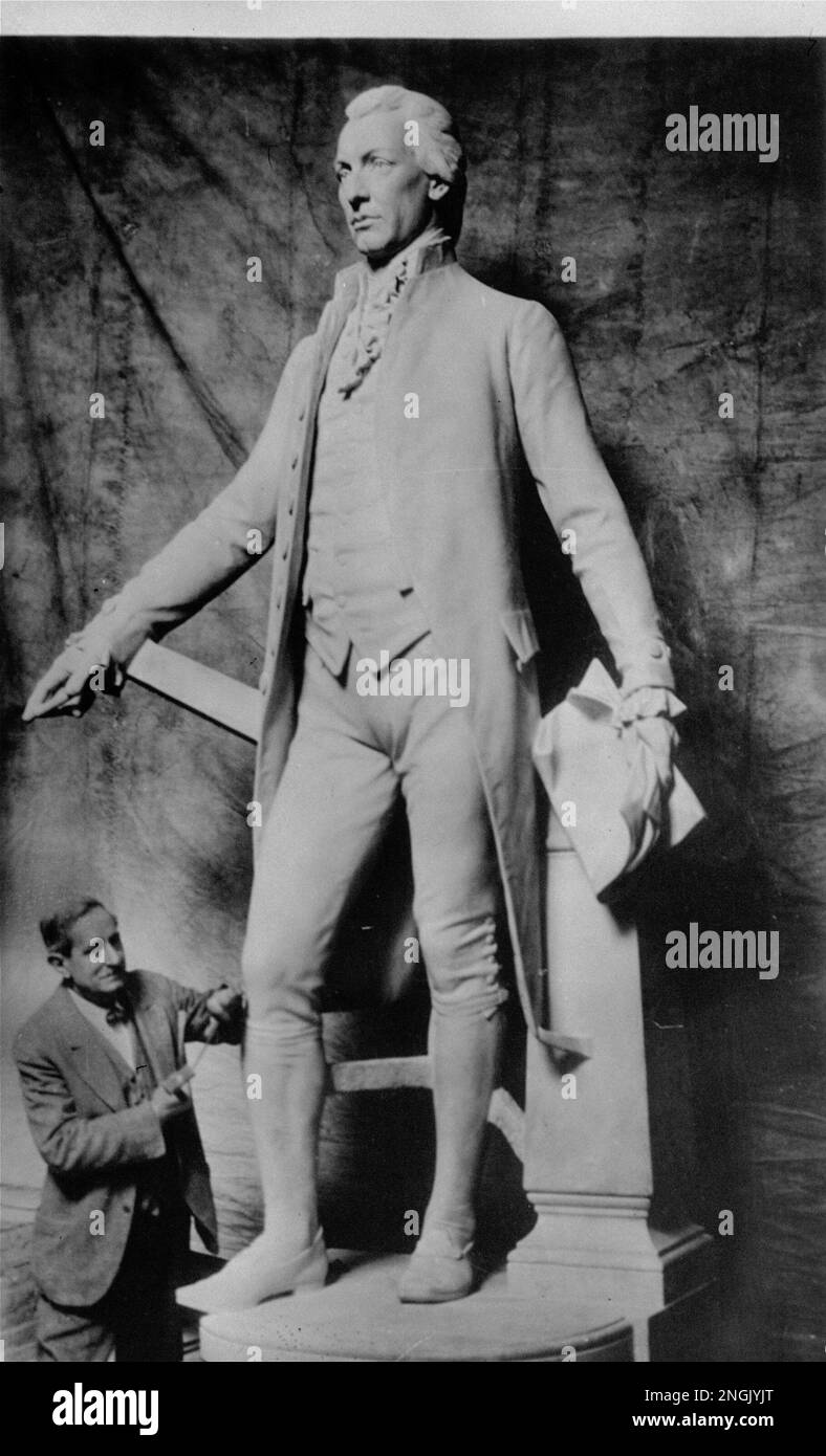Sculptor Attilio Piccirilli working on the statue of President James ...