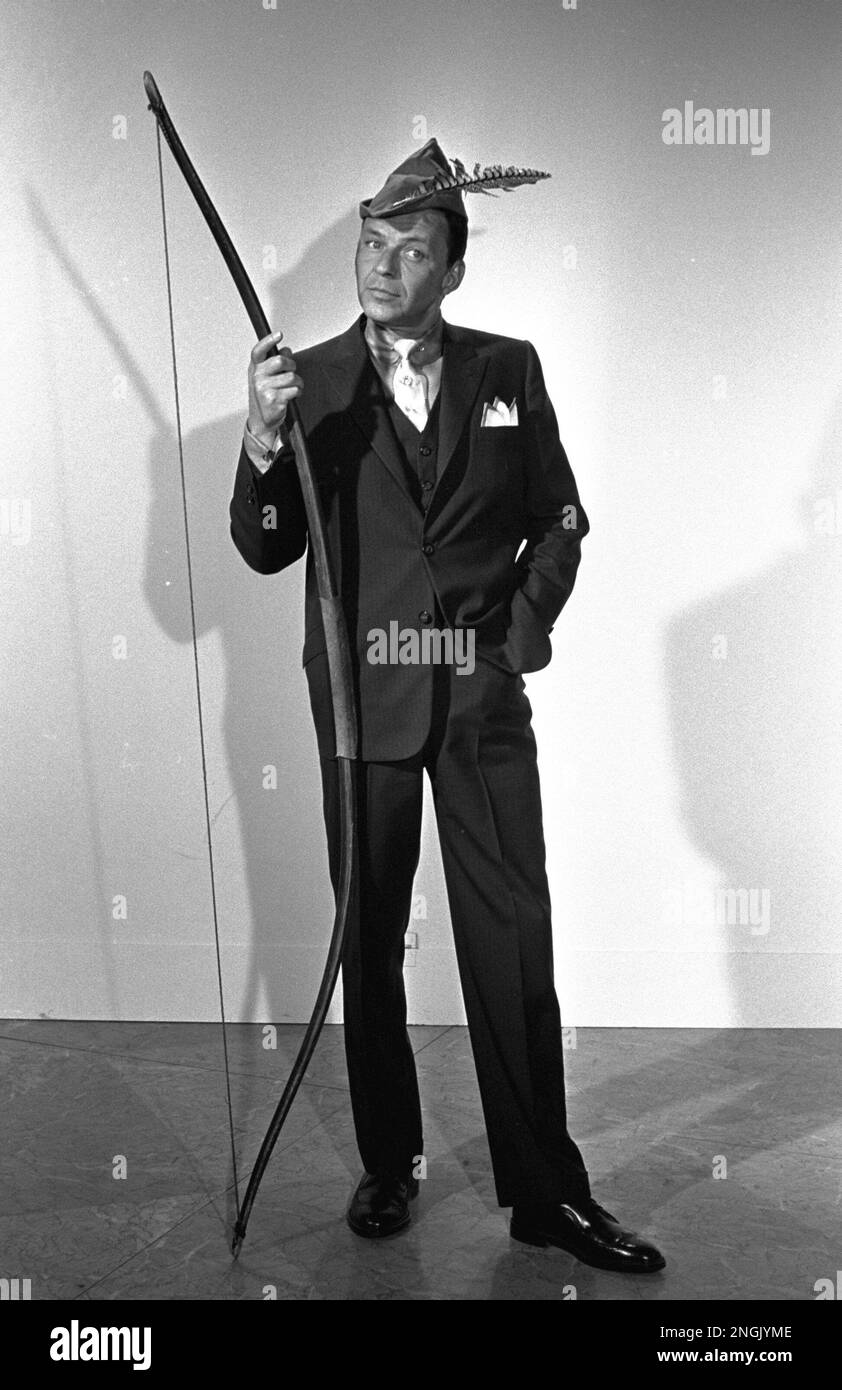 Frank Sinatra playing the role of Robbo in the movie "Robin and the 7 ...