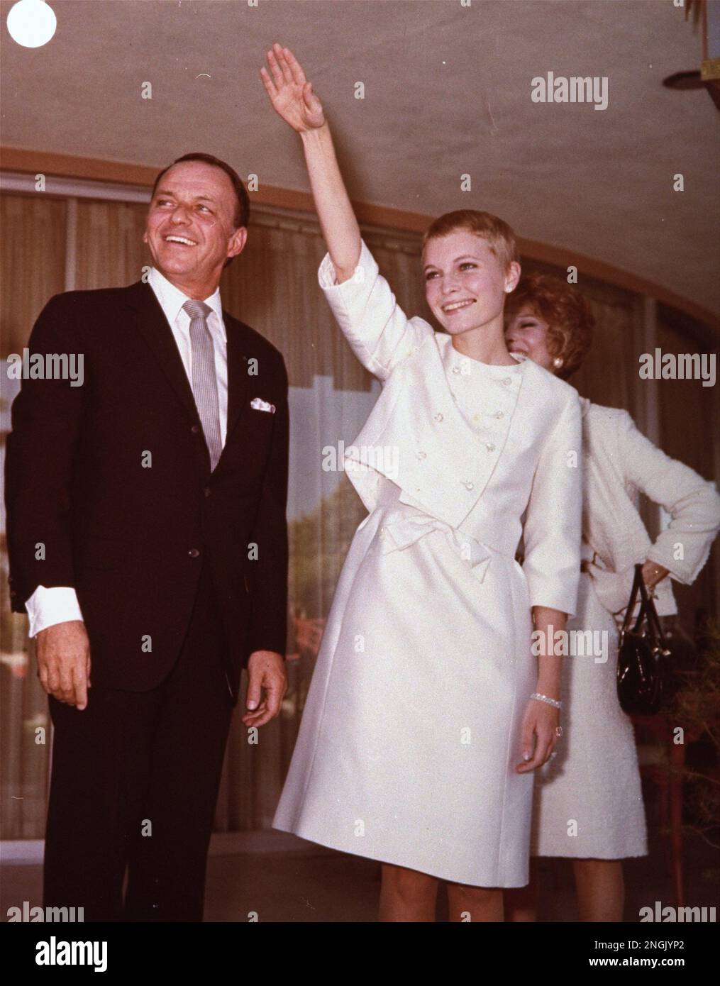 Singer Frank Sinatra and bride Mia Farrow are seen shortly after they ...