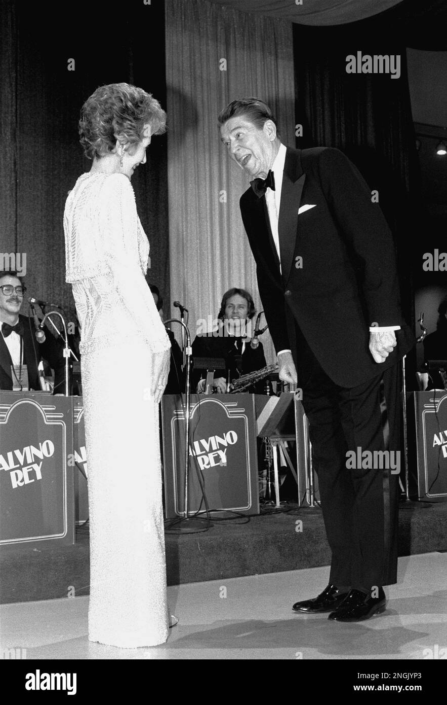 President Ronald Reagan gestures to first lady Nancy Reagan at the ...