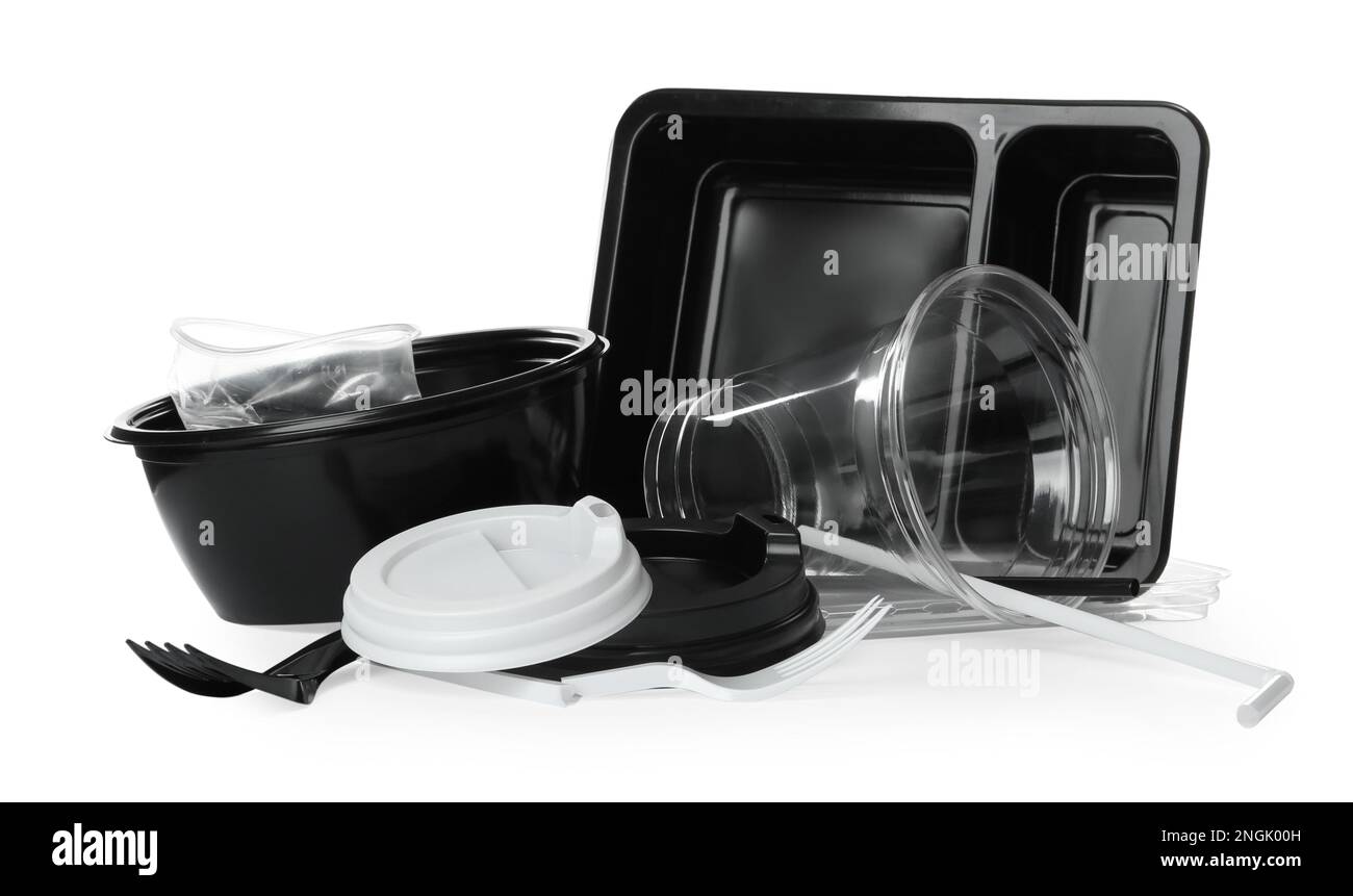 Pile of different plastic items on white background Stock Photo - Alamy