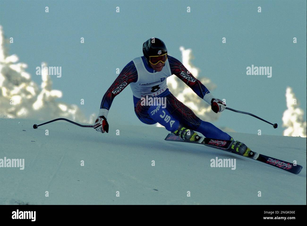 American Tommy Moe, of Palmer, Alaska, leans through a turn near the ...
