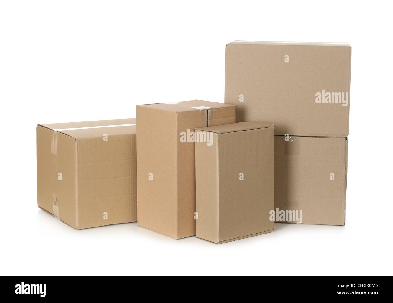Pile of cardboard boxes on white background Stock Photo - Alamy