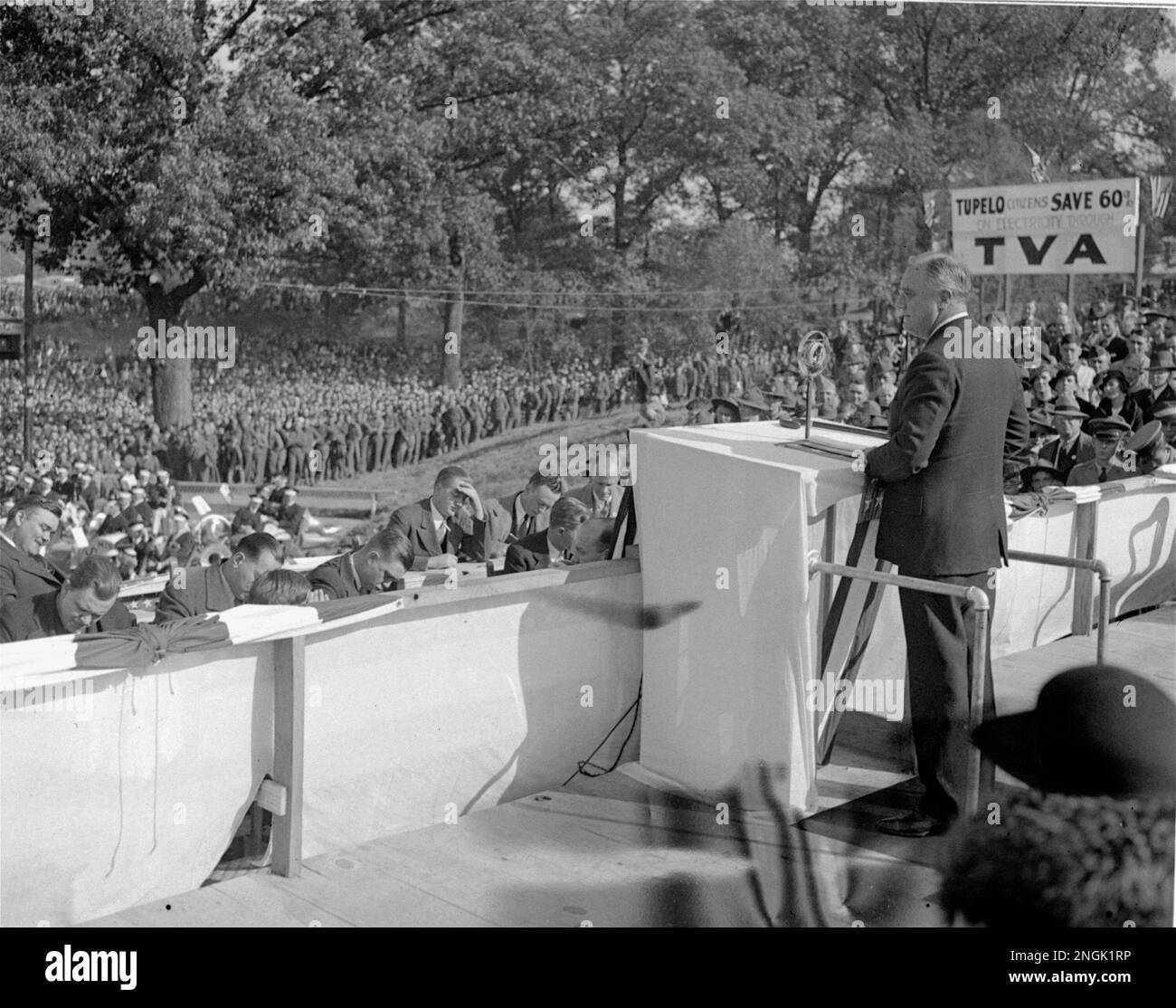 Residents of Tupelo, Miss., listen with rapt attention as President ...