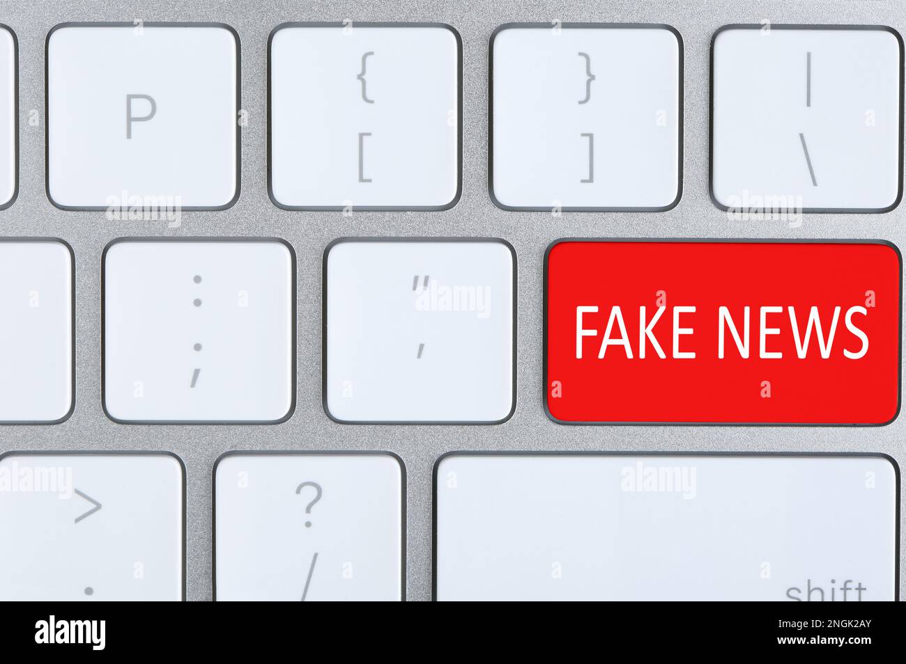 Modern computer keyboard with text FAKE NEWS on button, top view Stock ...