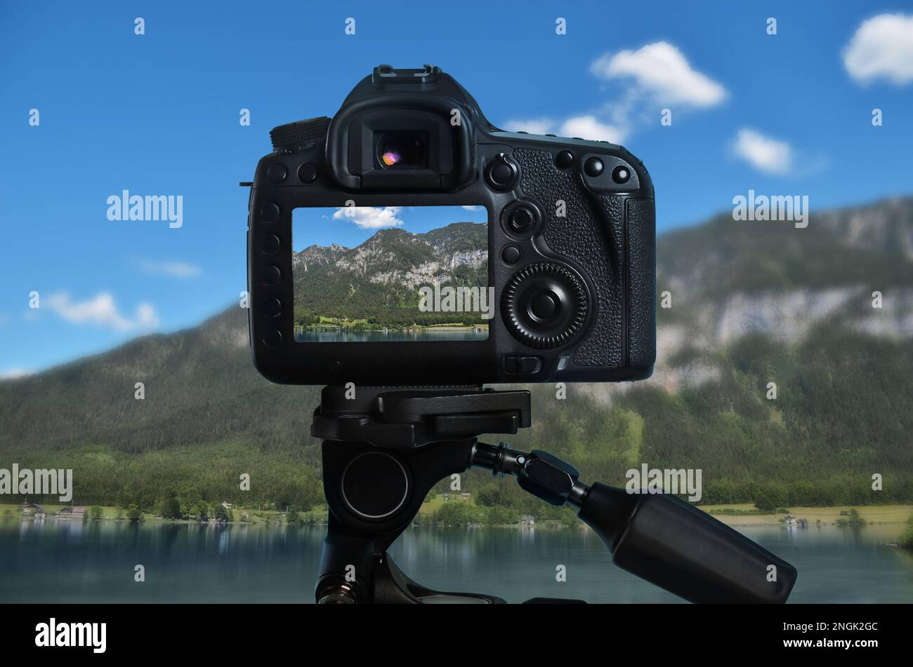 Taking photo of beautiful mountain landscape with camera mounted on ...