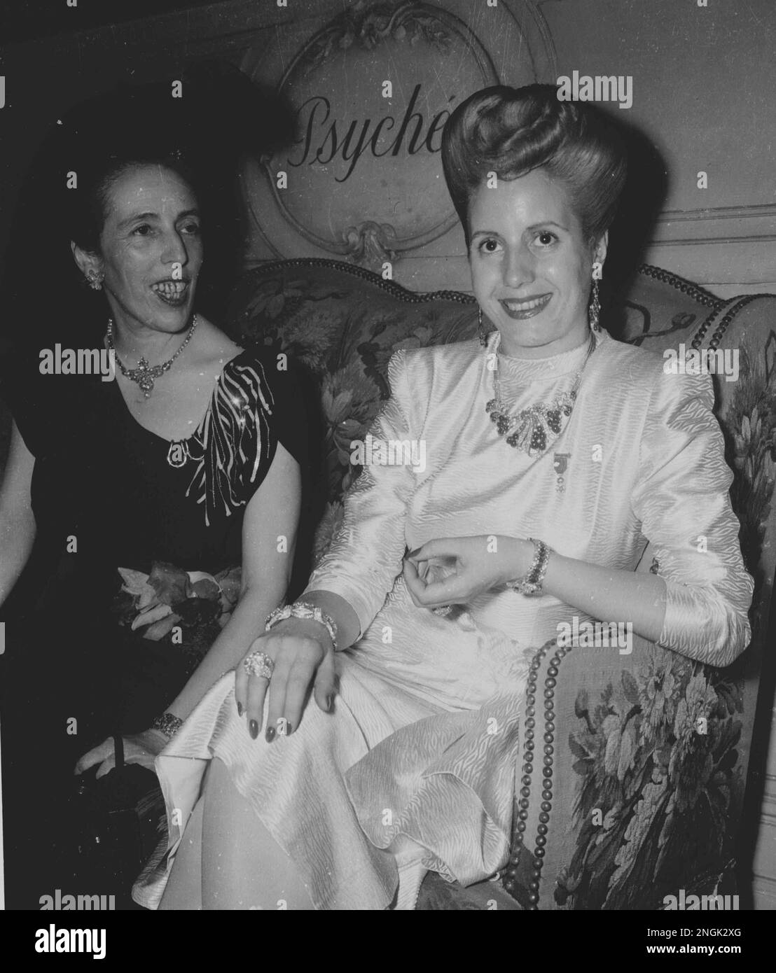 Madame Eva Peron sits with Argentine Ambassador Julie Victoria Roca at ...