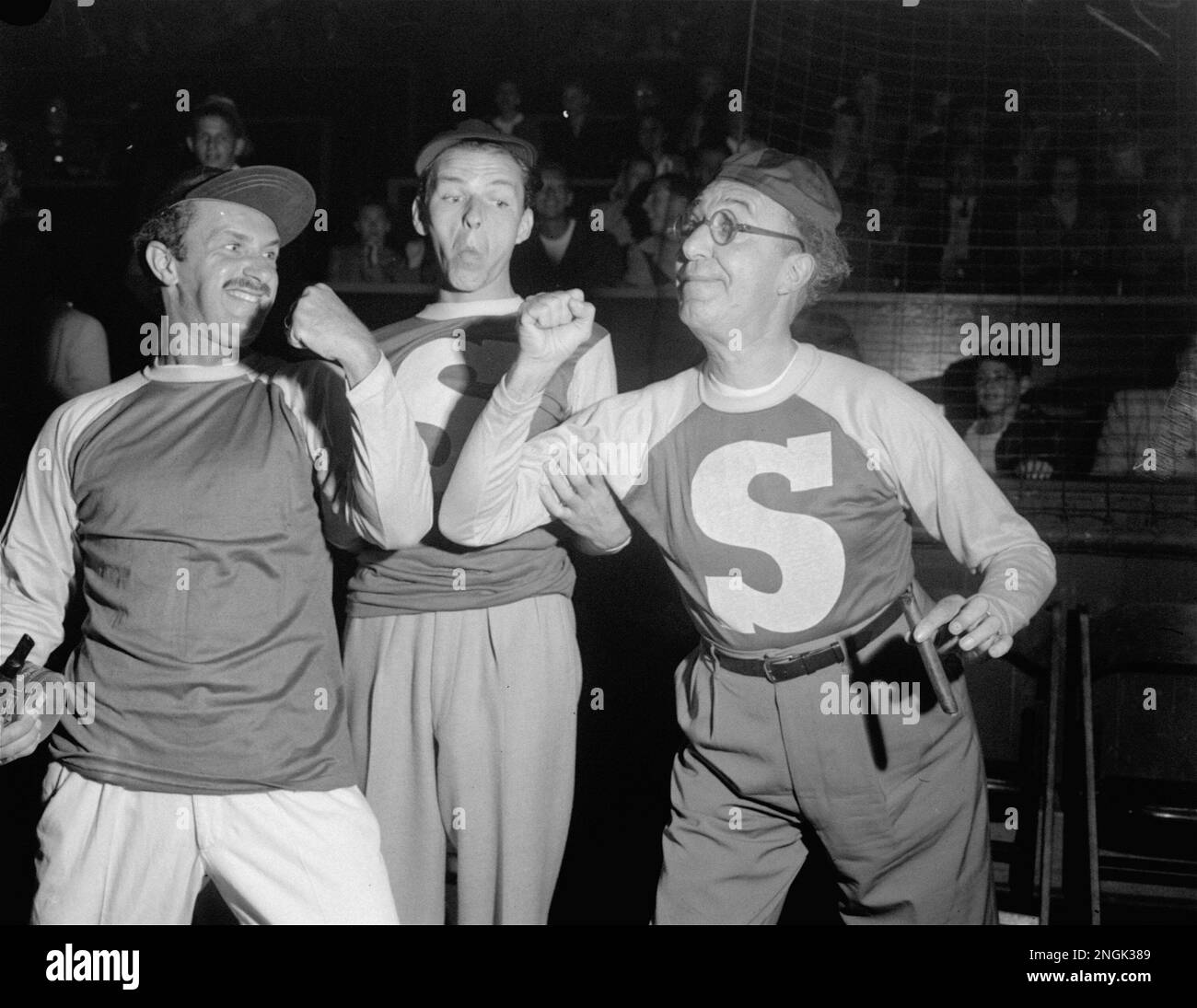 Keenan Wynn, left, and his father, Ed Wynn, show their muscled arms to ...