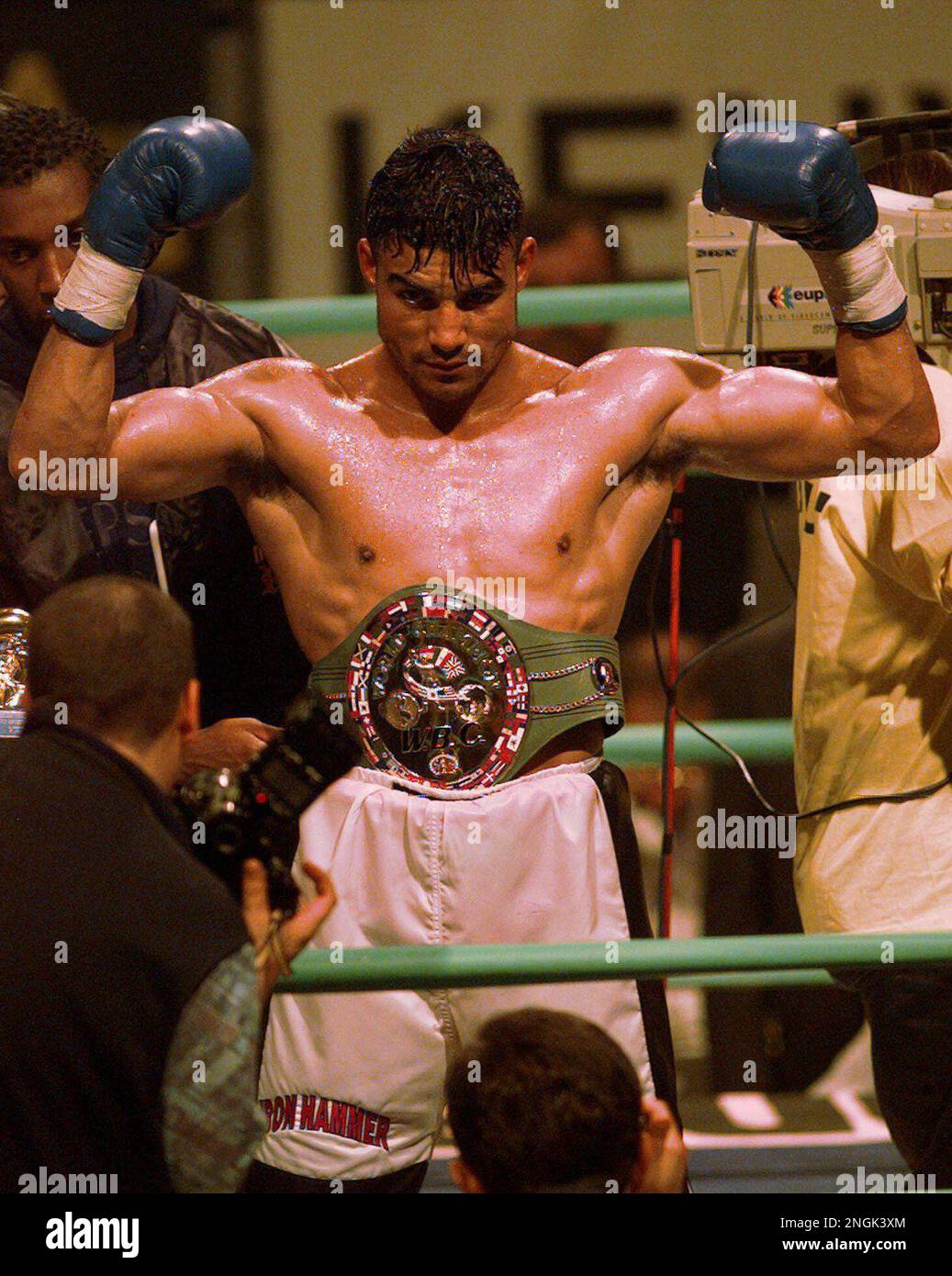 Robin Reid, of Great Britain, celebrates with the belt of WBC super ...