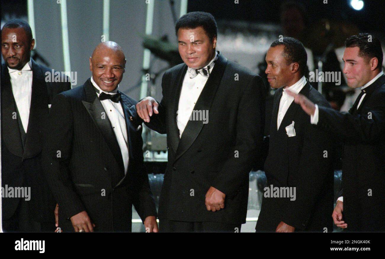 Boxing legends, from left, Tommy Hearns, Marvin Hagler, Muhammad Ali ...