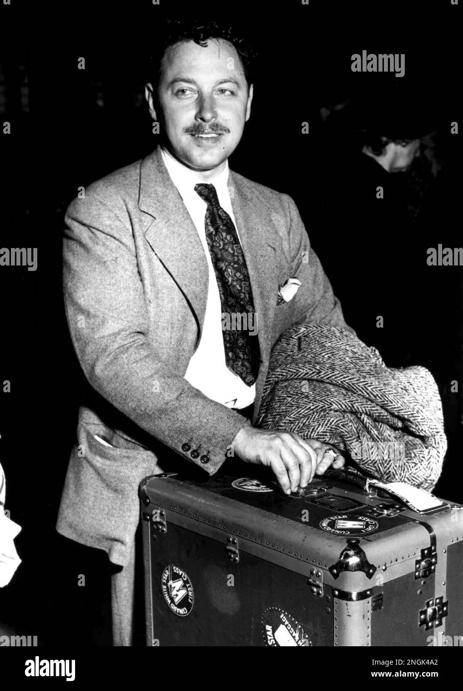 Playwright Tennessee Williams is shown as he arrives on the Queen Mary ...