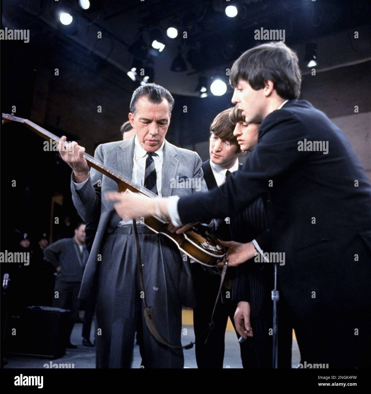 The Beatles are shown with Ed Sullivan on stage Feb. 10, 1964 before ...