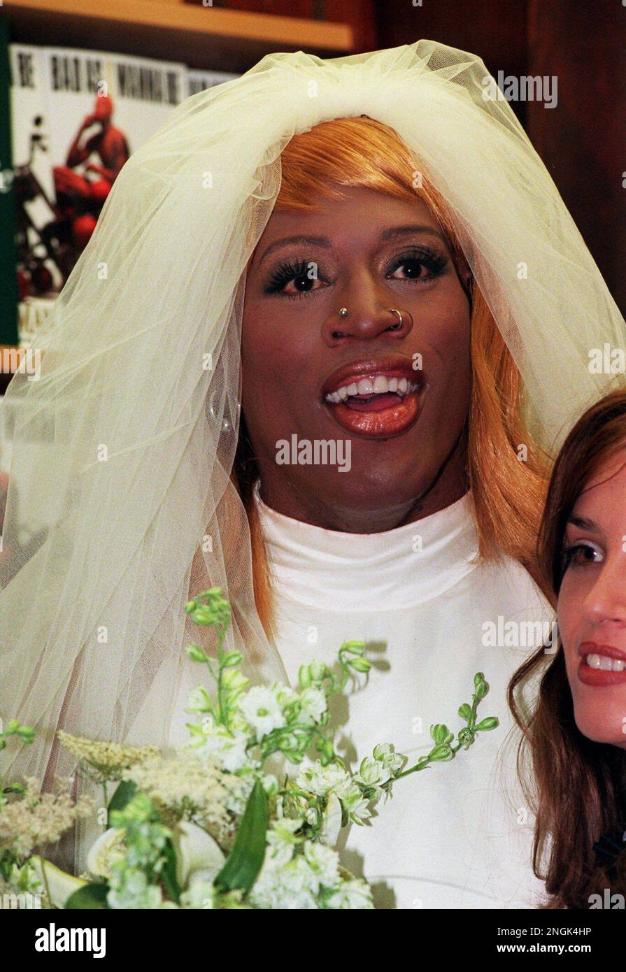 Chicago Bulls basketball forward Dennis Rodman, dressed as a bride ...