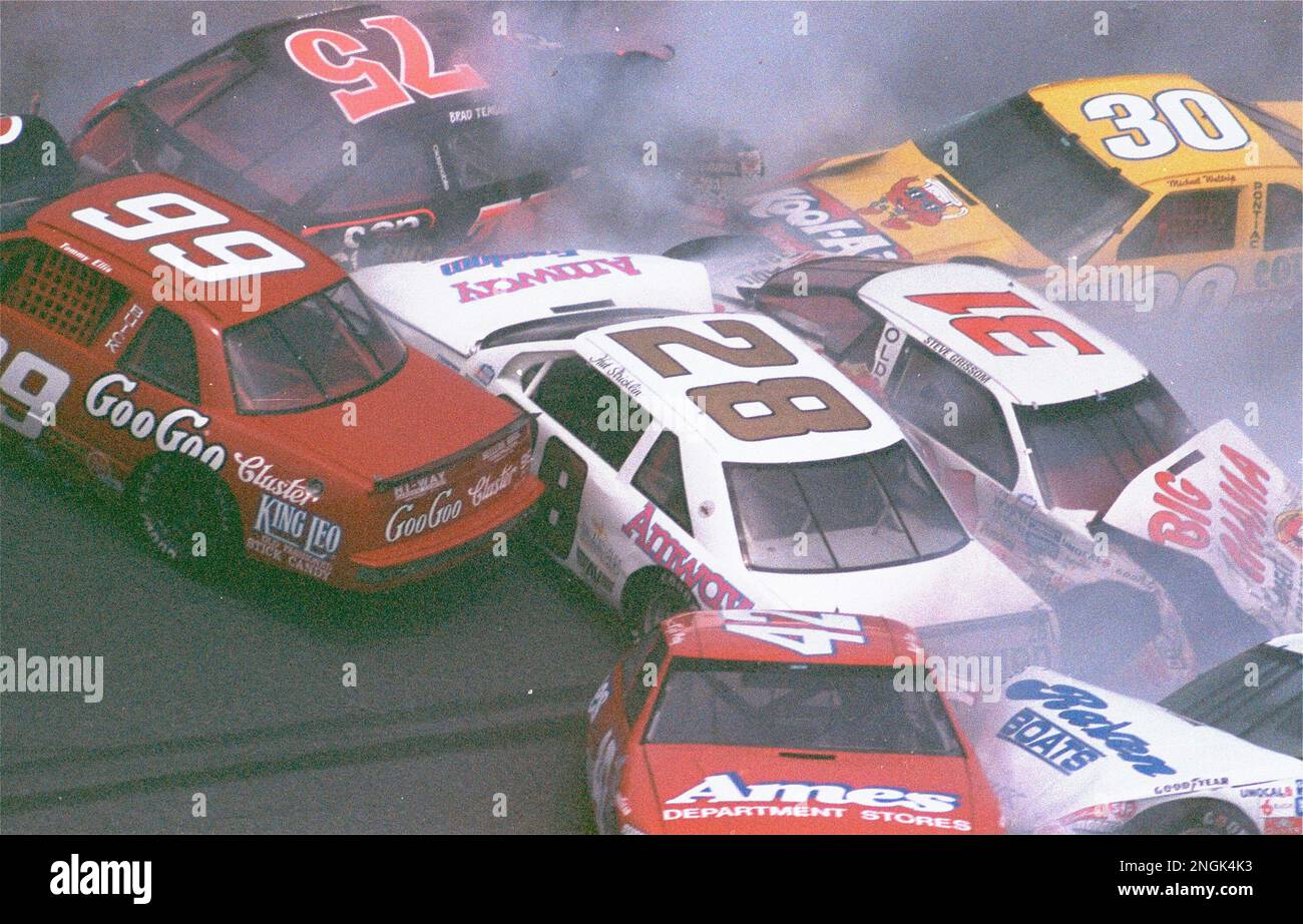 Race cars crash together during the early running Saturday, February 17 ...
