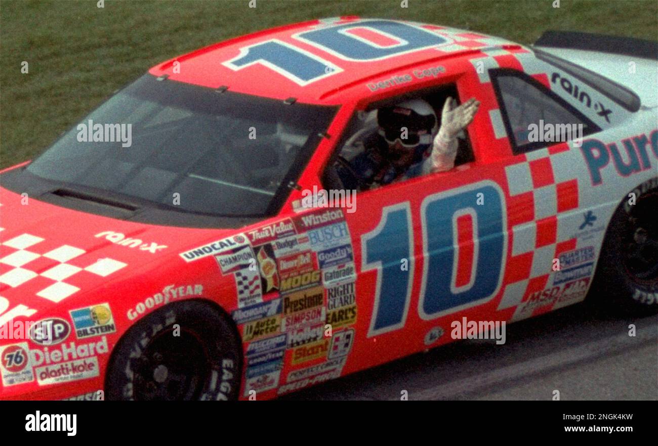 Derrike Cope, from Spanaway, Washington, waves from his Chevrolet racer ...