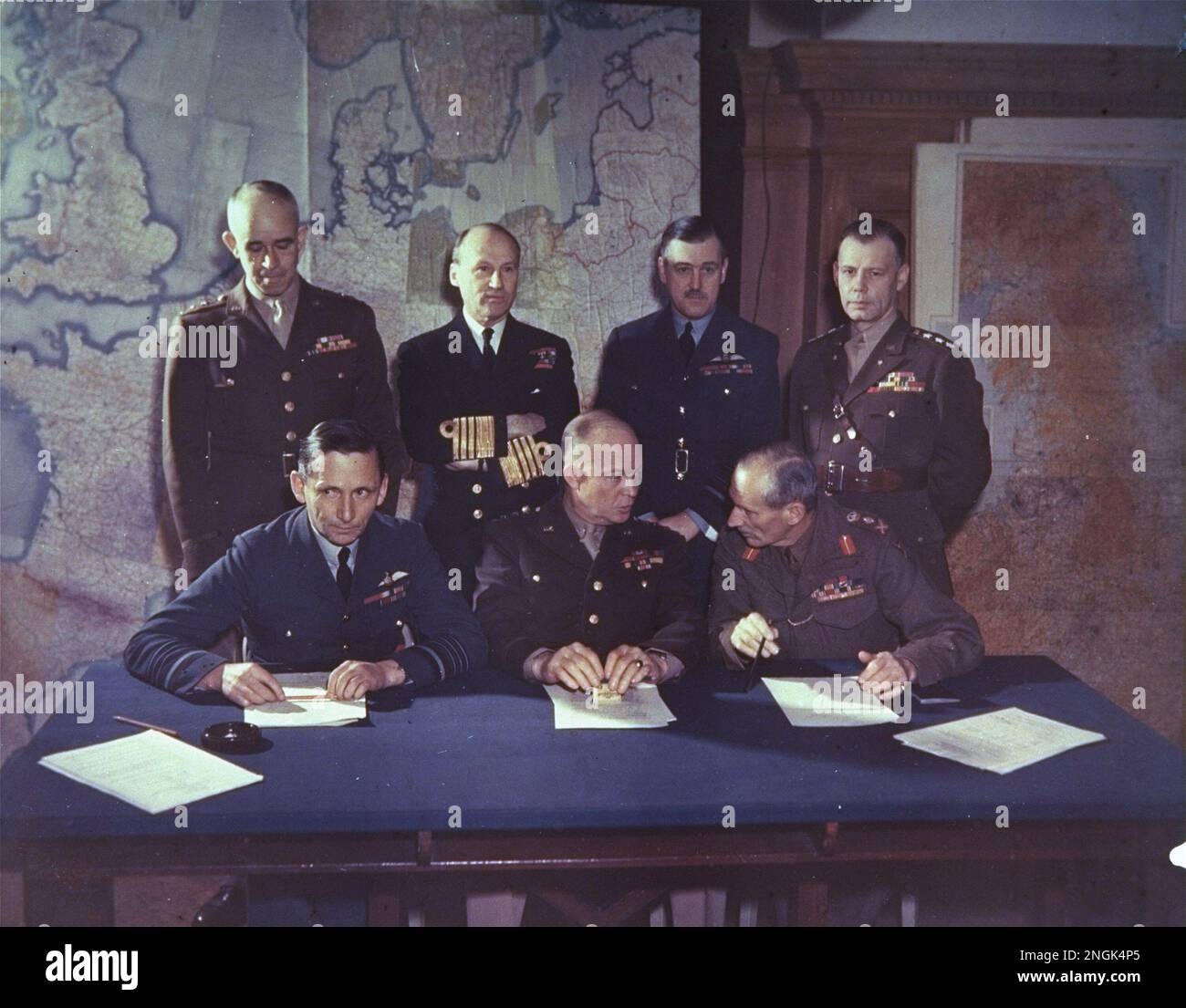 U.S. General Dwight D. Eisenhower is seen seated with other members of ...