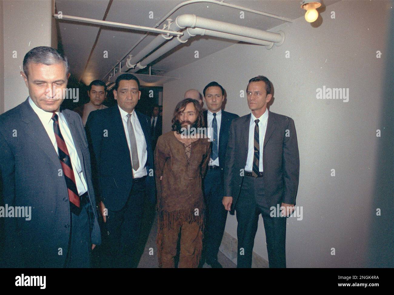Charles Manson is escorted to and from Los Angeles Court December 11 ...