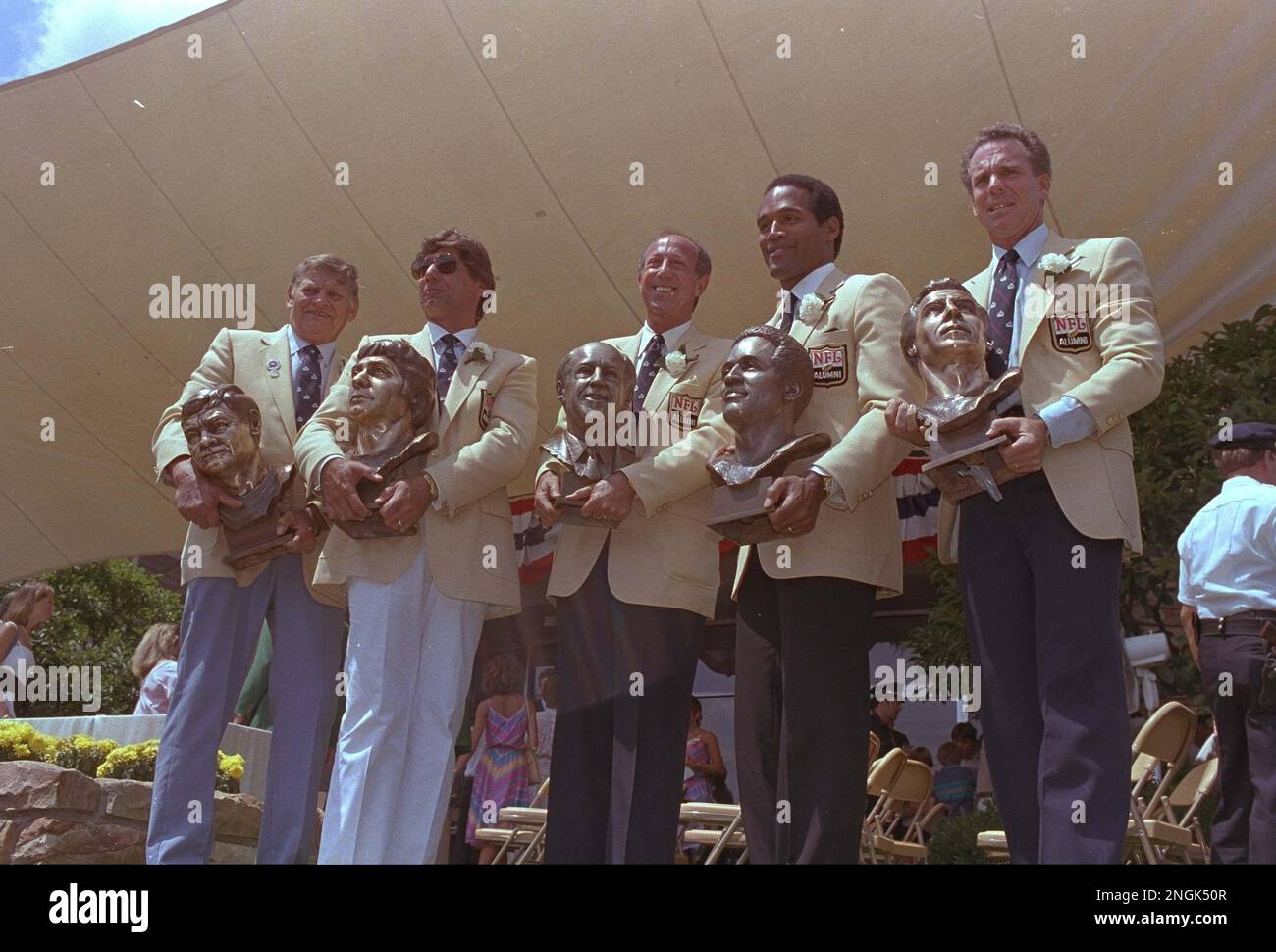 The five enshrines into the Pro Football Hall of Fame pose with their ...