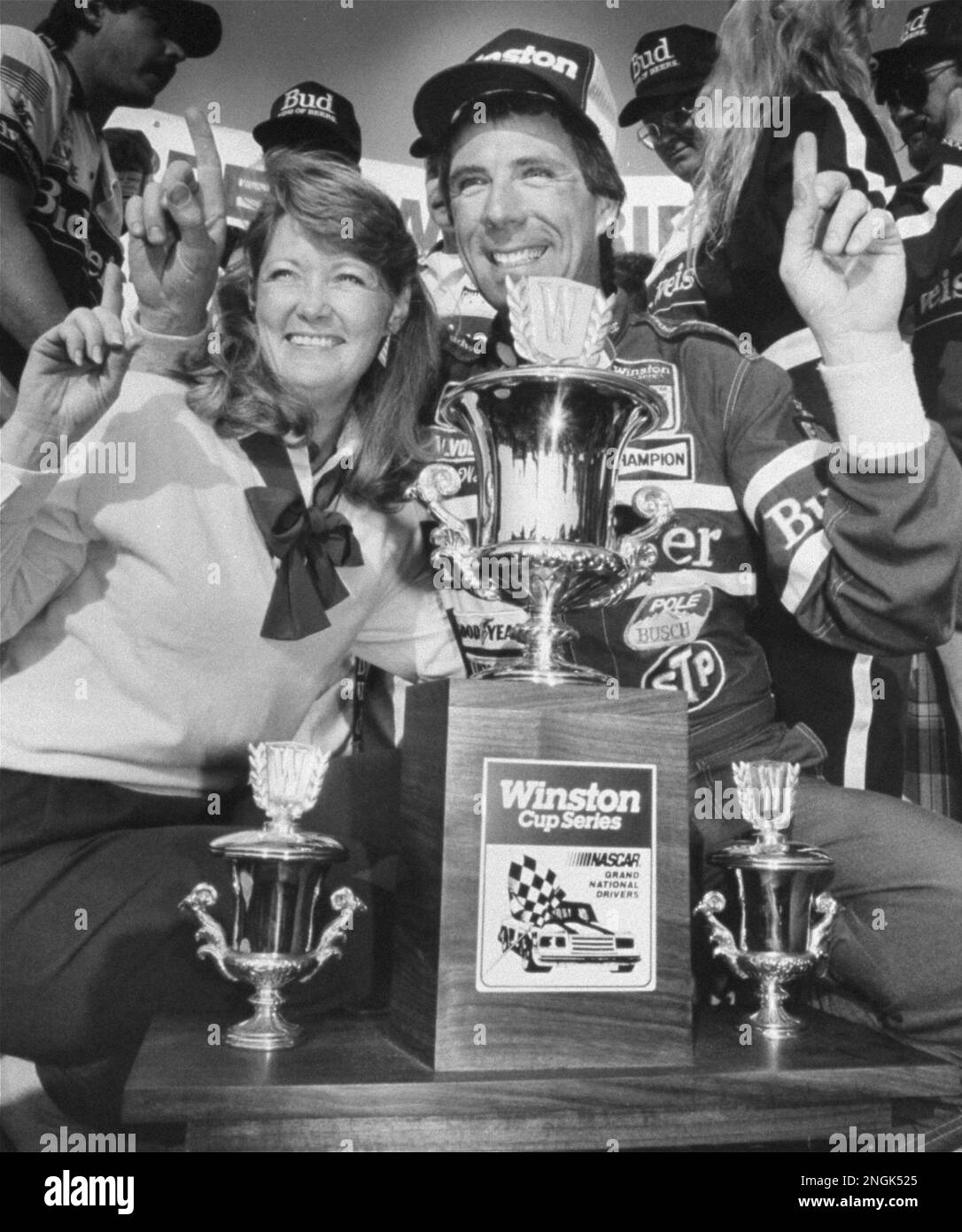 NASCAR driver Darrell Waltrip rejoices with his wife, Stevie, after ...
