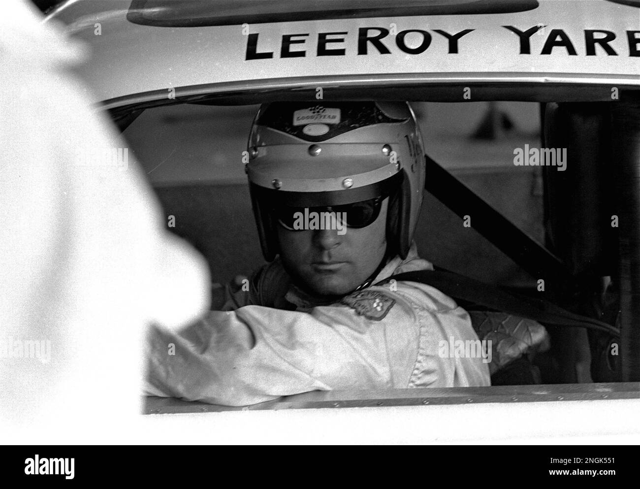 Lee Roy Yarbrough, stock car racer from Columbia, S.C., is seen between ...