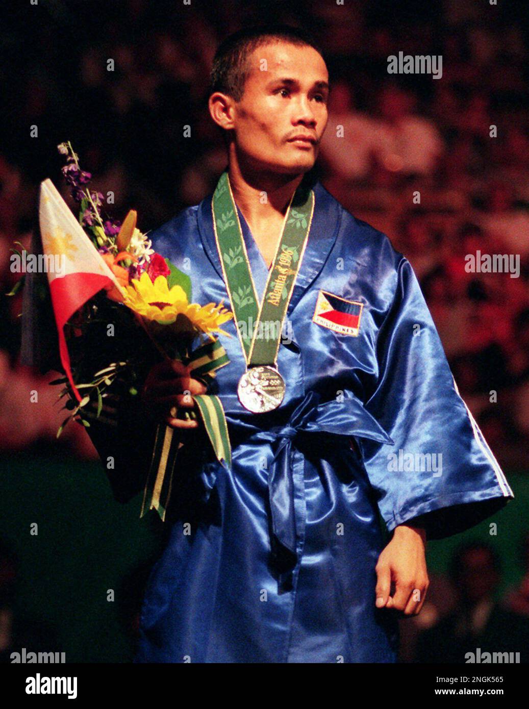 Mansueto Velasco, of the Philippines, stands with his silver medal ...