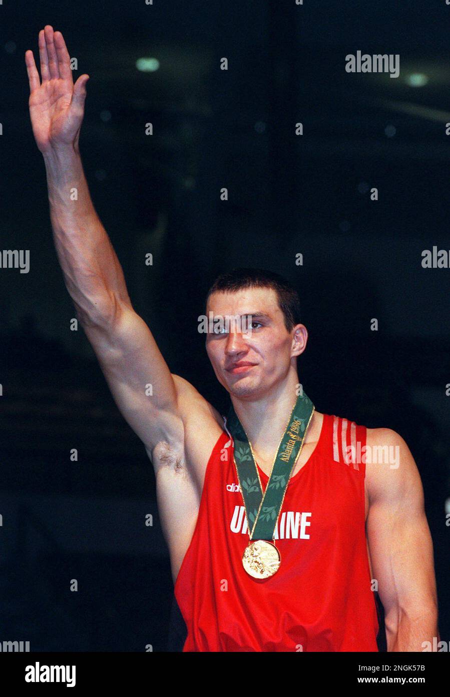 Wladimir Klitschko, of the Ukraine, wears the gold medal he won after ...